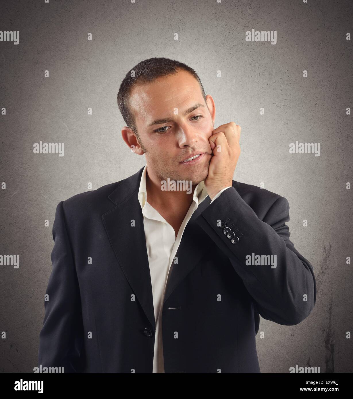 Businessman under tension Stock Photo - Alamy