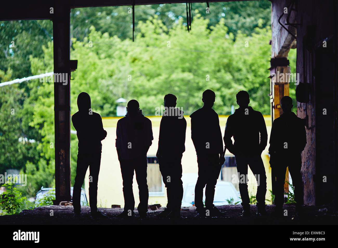 Outlines of gangster team outside Stock Photo - Alamy