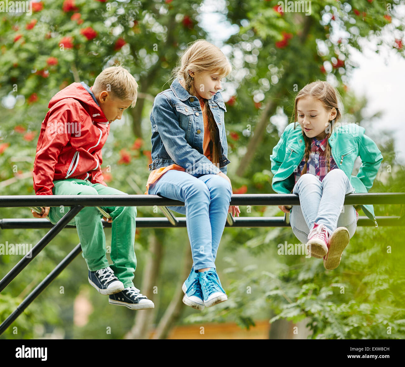Friendly kids spending leisure outdoors Stock Photo - Alamy