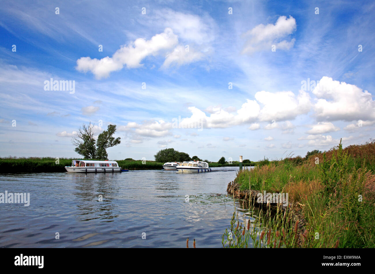 A view of boats on the River Bure on the Norfolk Broads near Horning ...