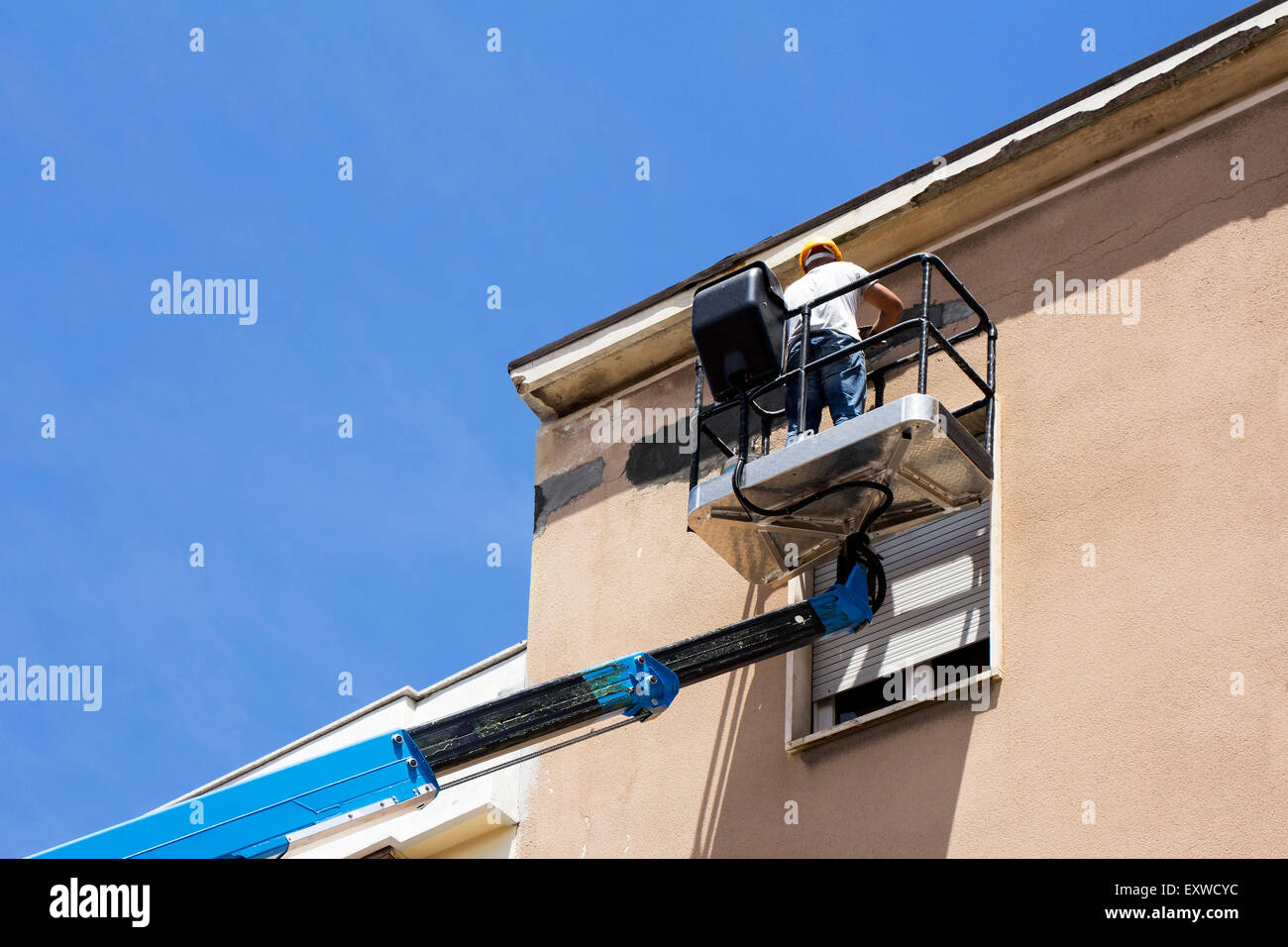 Lifting concrete bucket up by crane hi-res stock photography and images ...