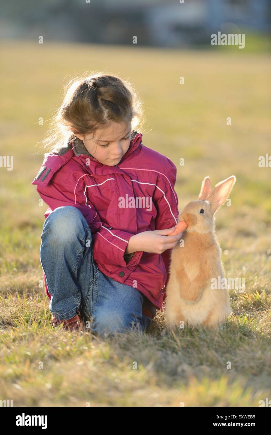 Girl Feeding Rabbit
