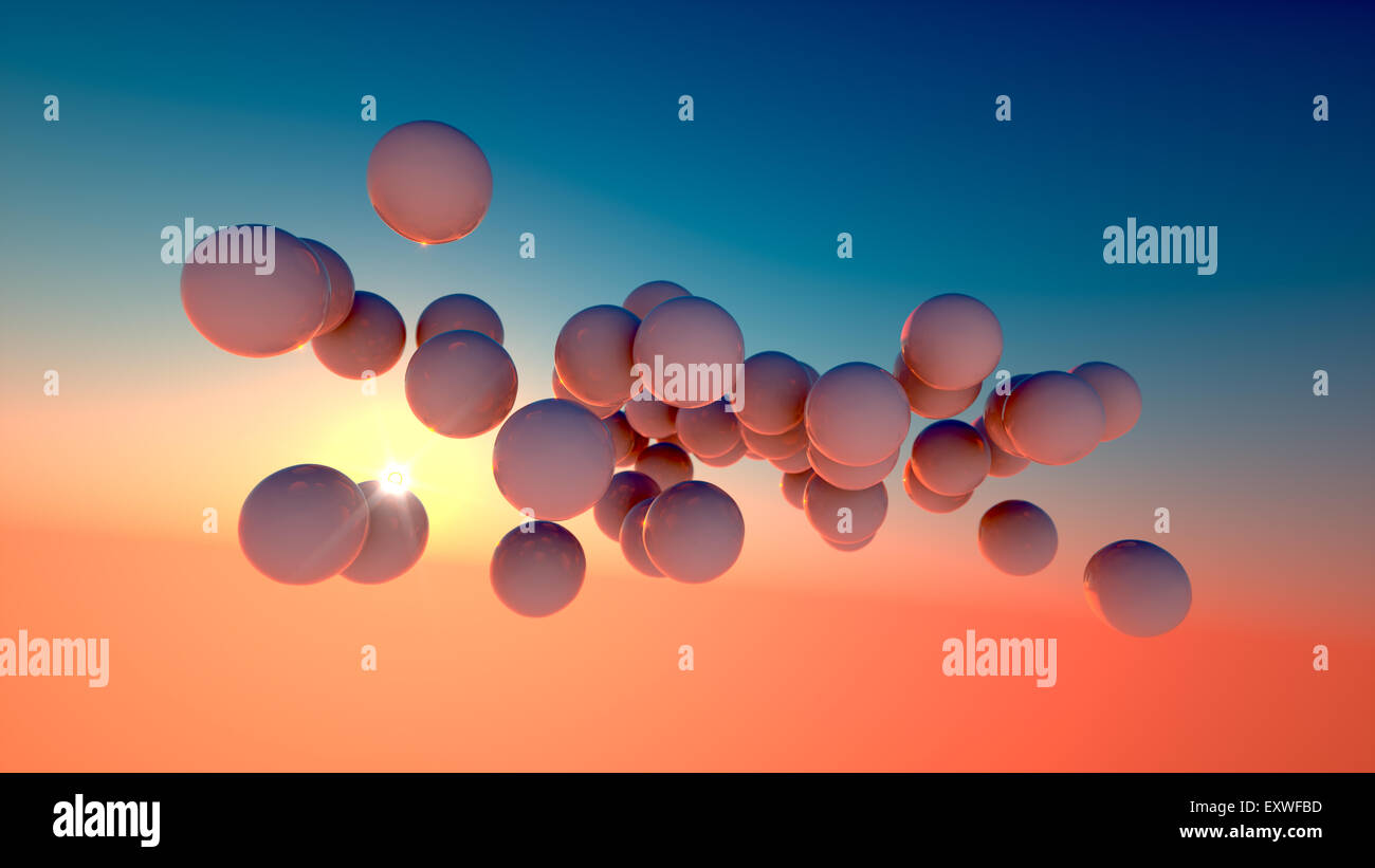 White balls floating in the blue and orange sky Stock Photo - Alamy