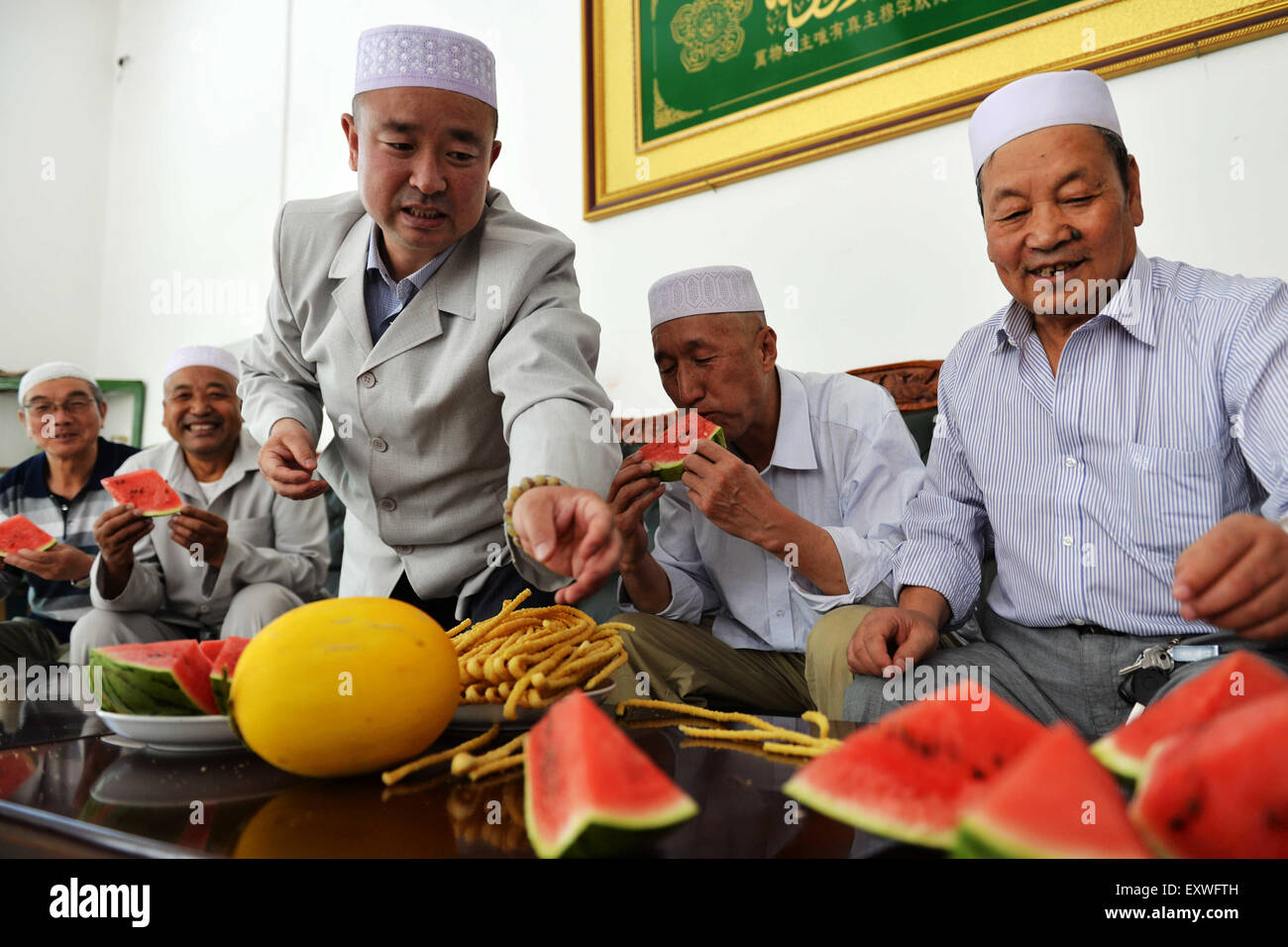 Lanzhou, China's Gansu Province. 17th July, 2015. Muslims attend Eid al ...