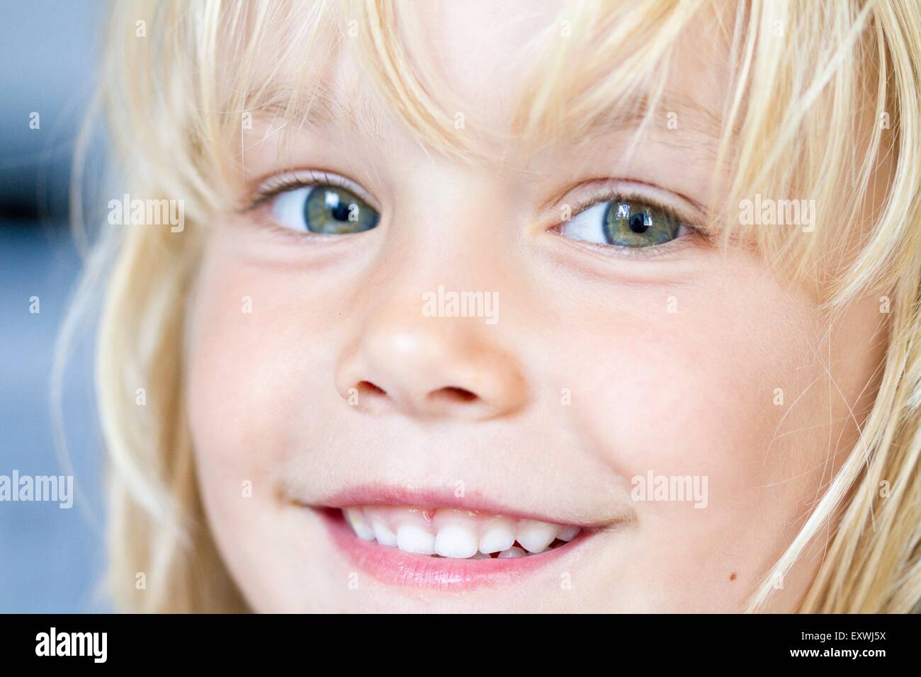 Girl smiling at camera Stock Photo - Alamy