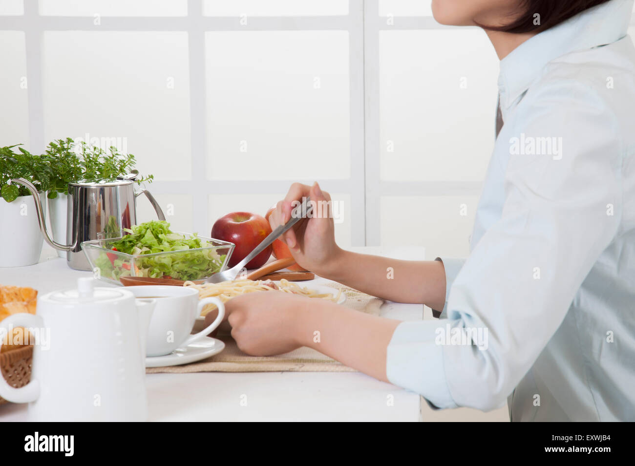 Woman breakfast table hi-res stock photography and images - Alamy