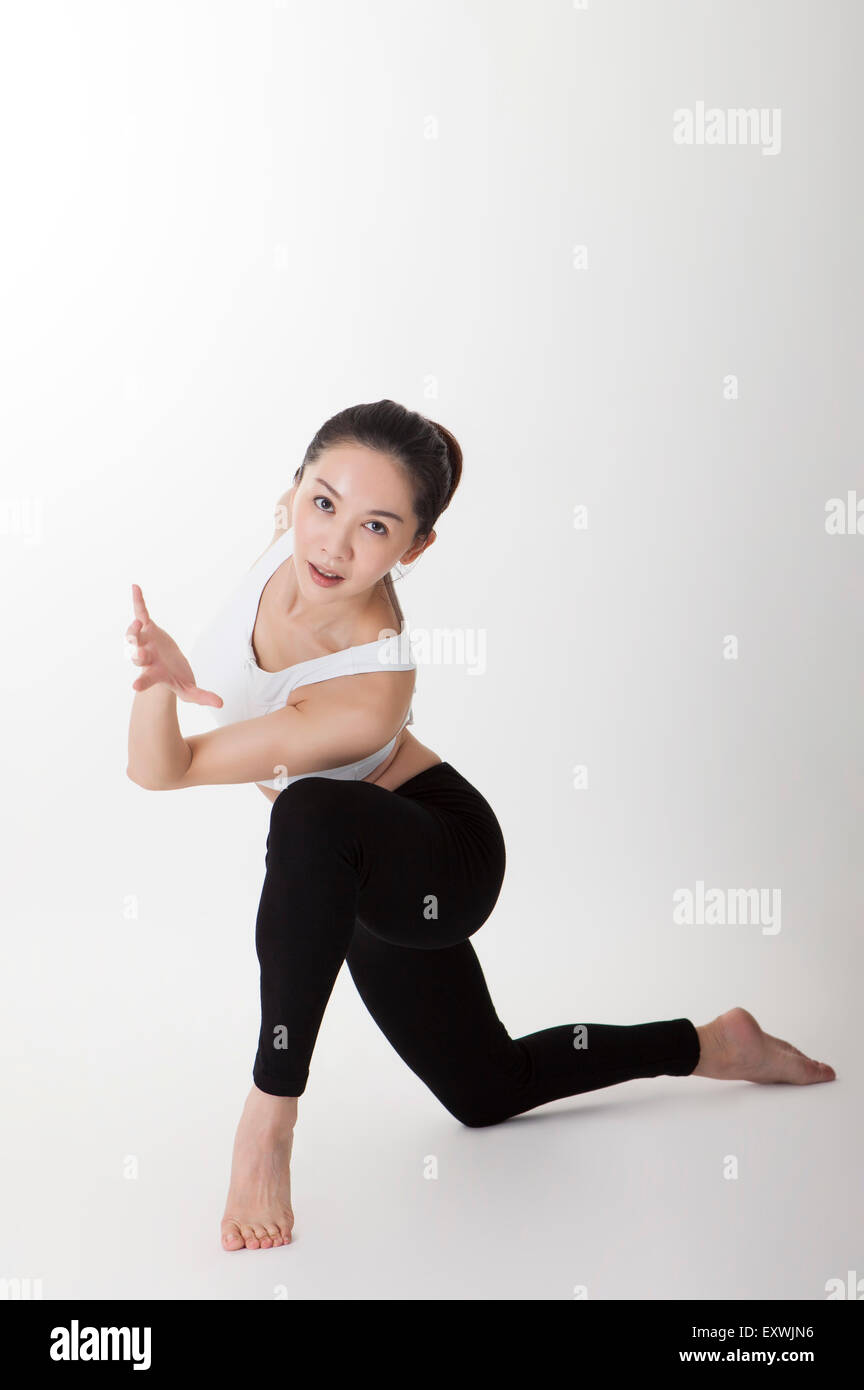 Crouching looking at camera hi-res stock photography and images - Alamy