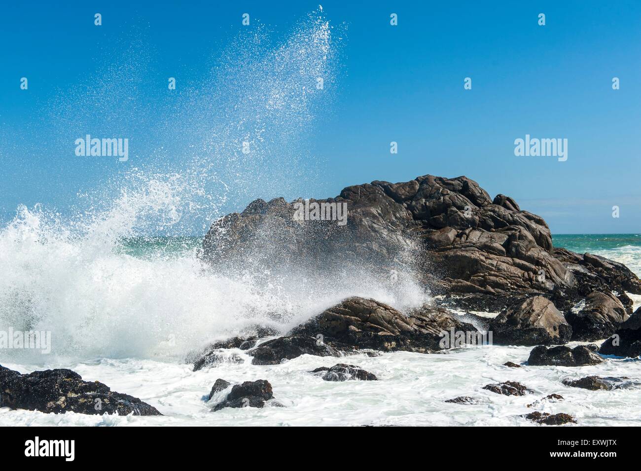 Wave crushing on rocks, Hermanus, South Africa Stock Photo - Alamy