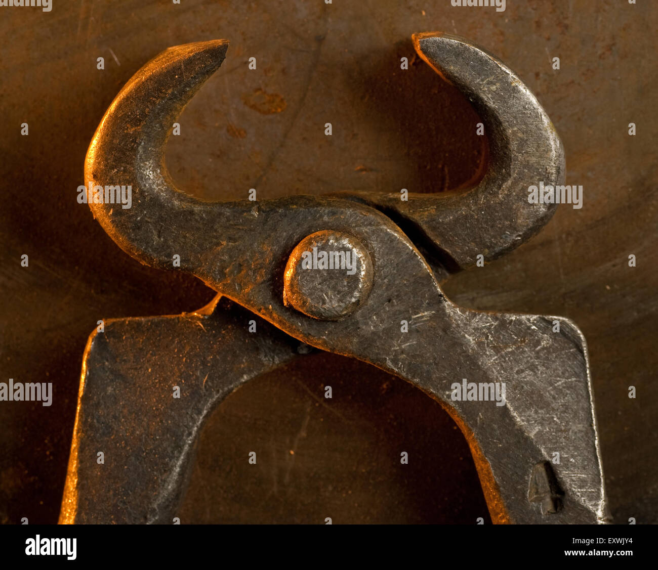Old metal tongs Stock Photo - Alamy
