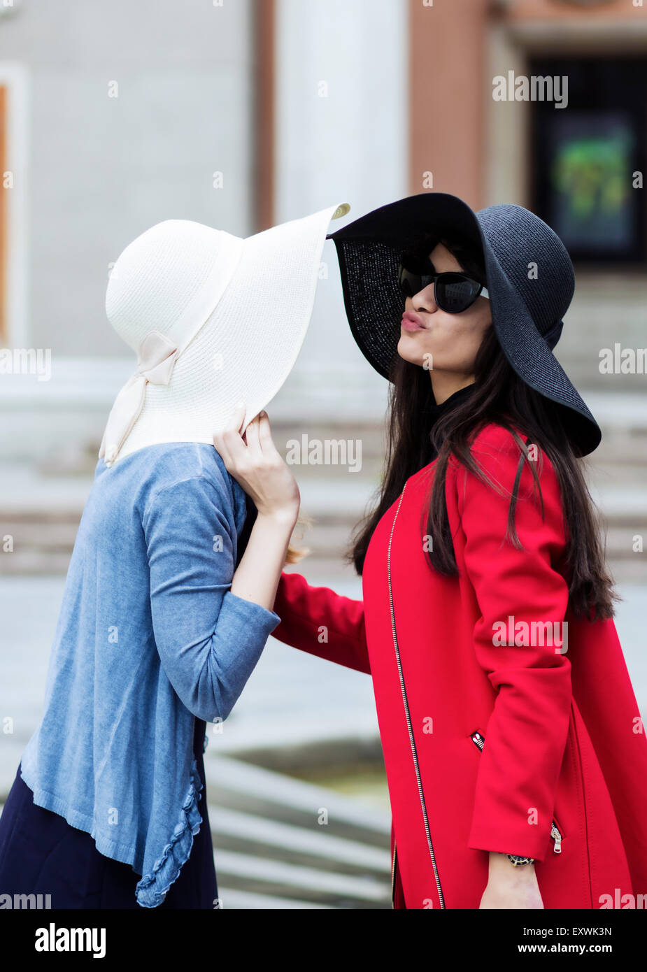 Two girls kiss hi-res stock photography and images - Alamy