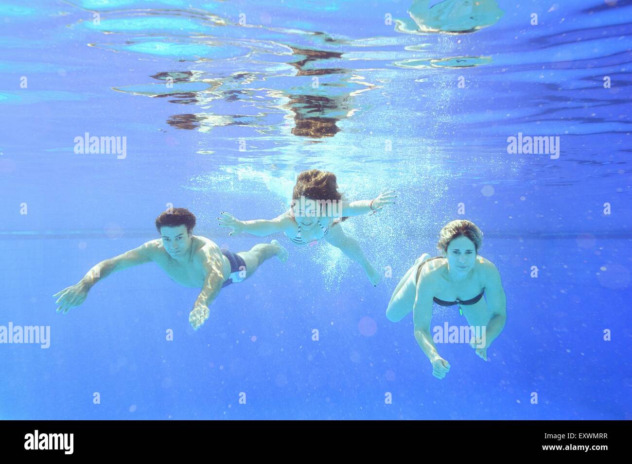 Women swimming pool diving hi-res stock photography and images - Alamy