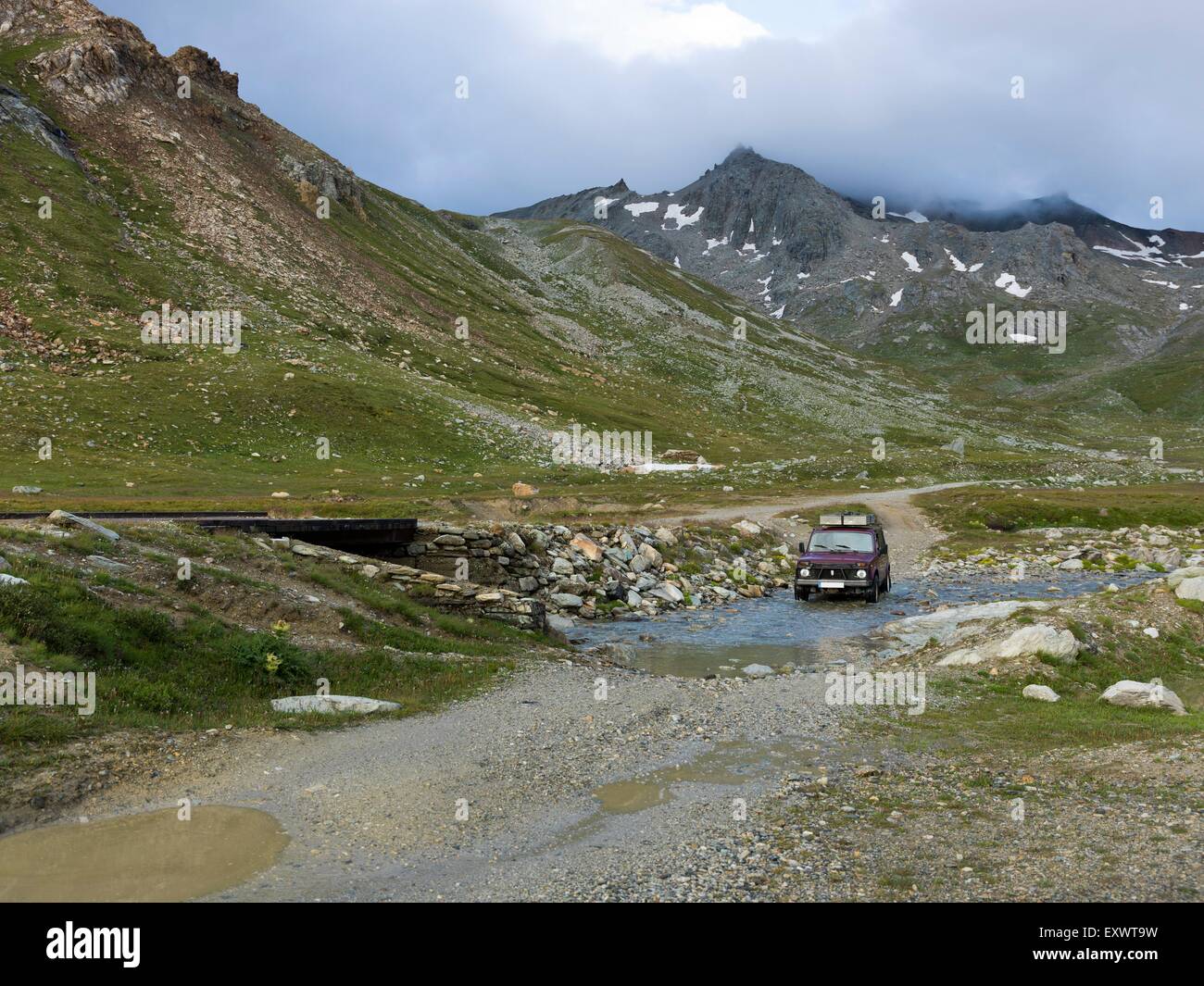 Off-road vehicle, Col de Sommeiller, Cottian Alps, West Alps, Piemont ...
