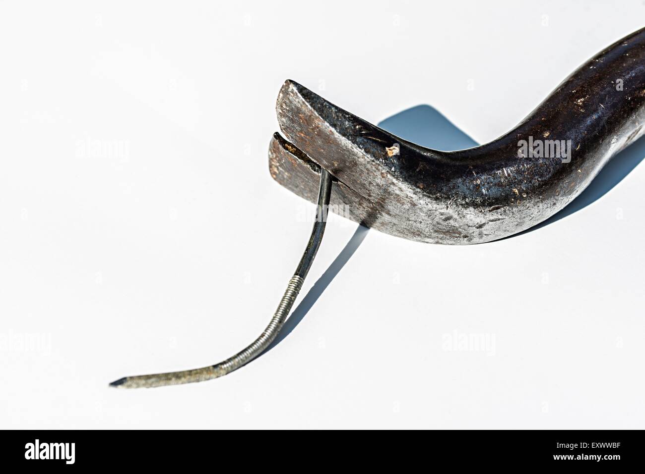 Crowbar with nail Stock Photo - Alamy