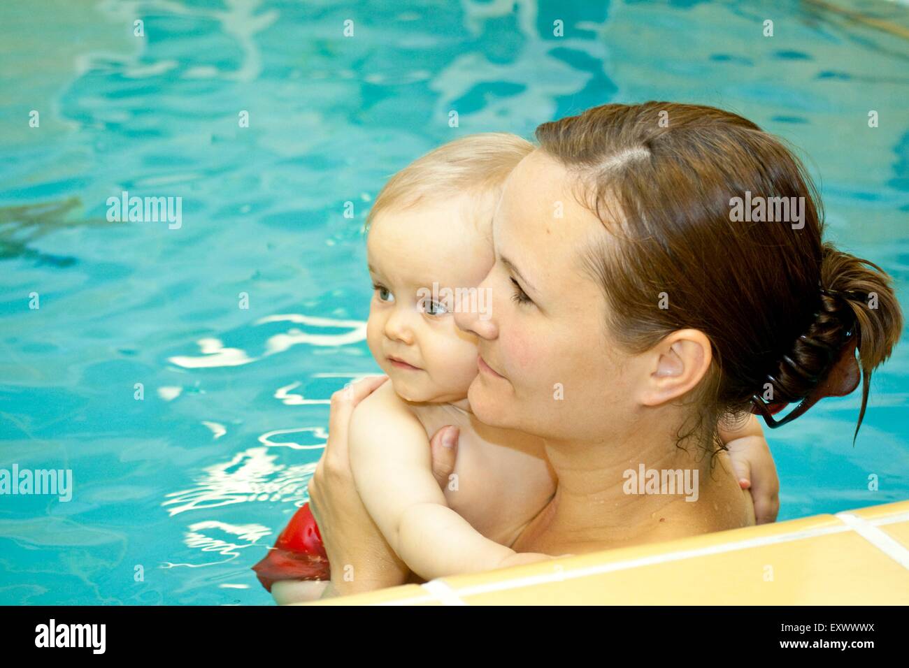 Mother and daughter doing infant swimming Stock Photo - Alamy