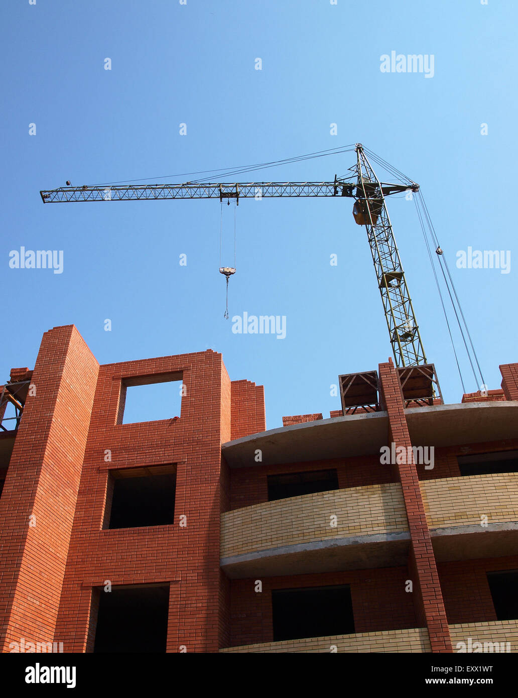 Multistory building from brick under construction with no roof and ...