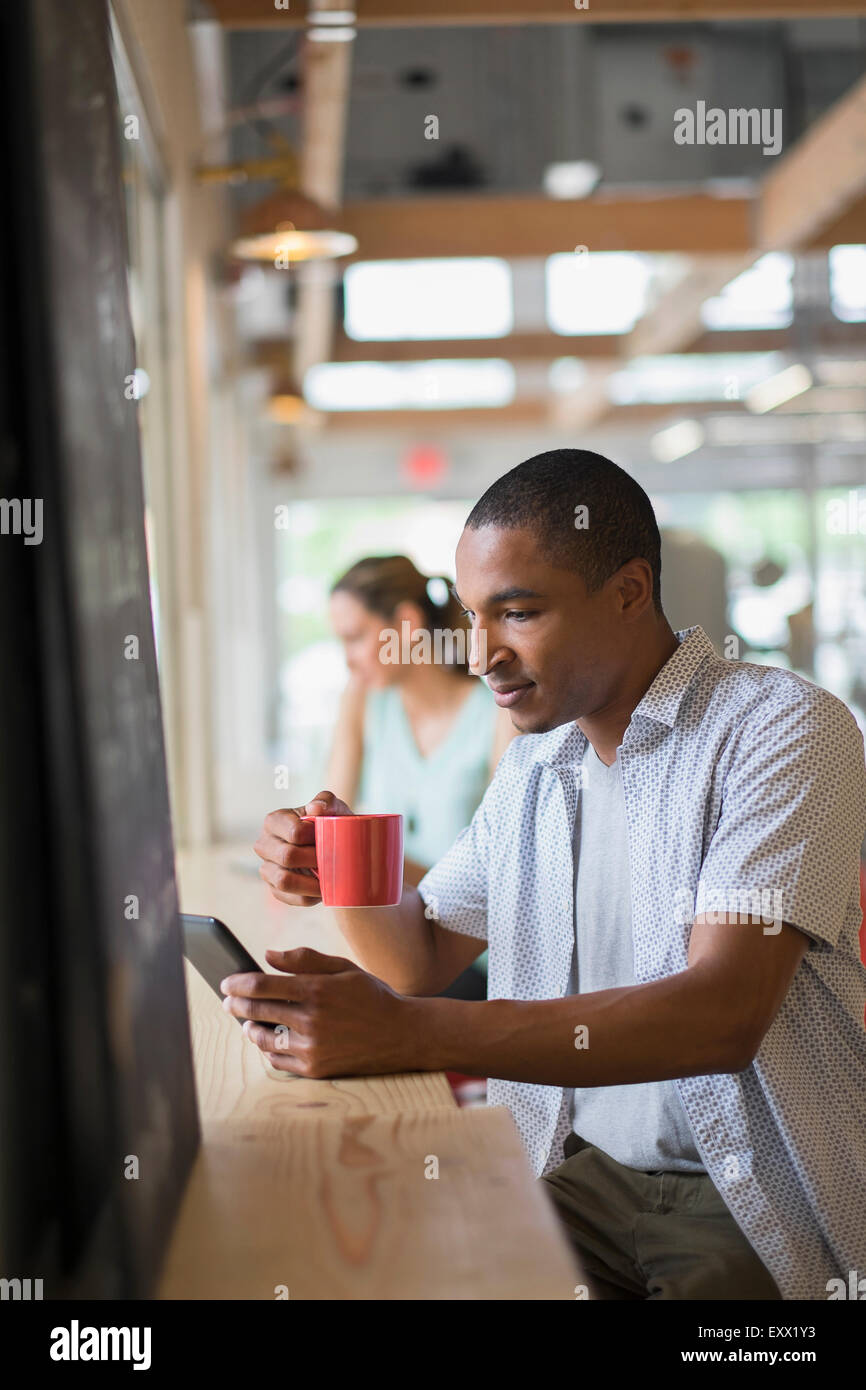 People in coffee shop Stock Photo - Alamy