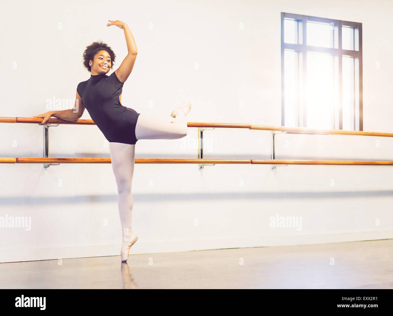 Young flexible woman dancing in hi-res stock photography and images - Alamy