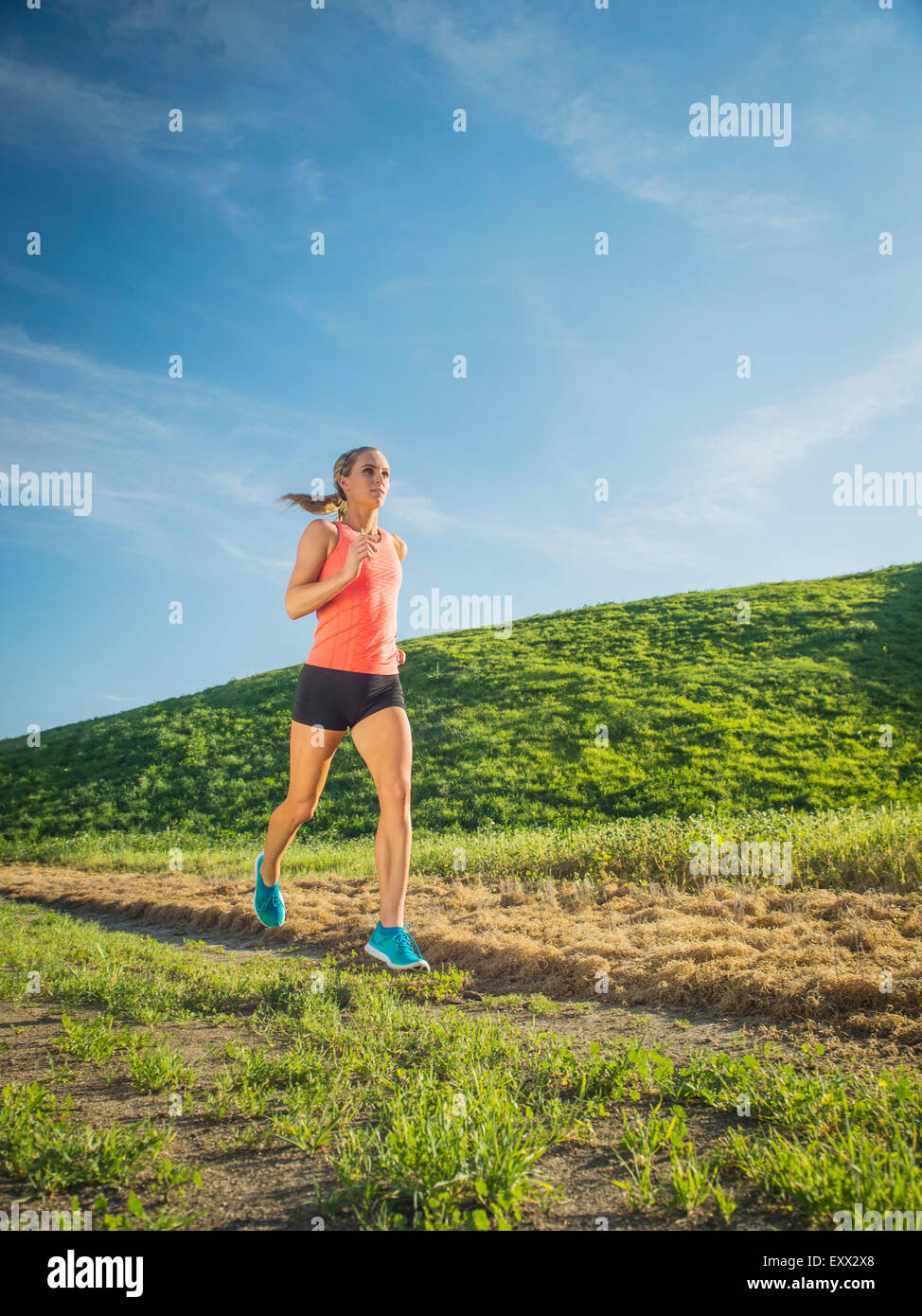 Woman Running In Field