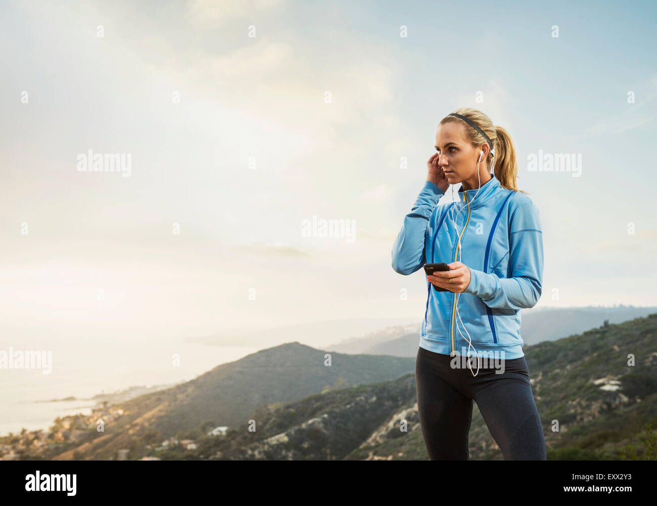 Female checking phone hi-res stock photography and images - Alamy