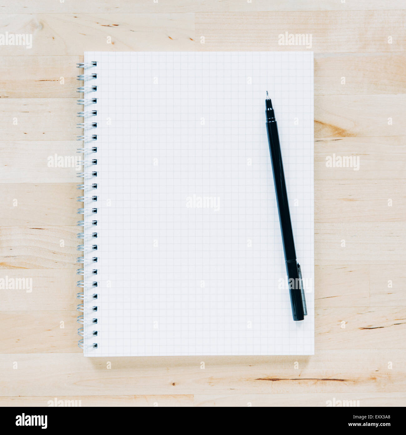 Overhead of graph paper and pen on a desk Stock Photo - Alamy