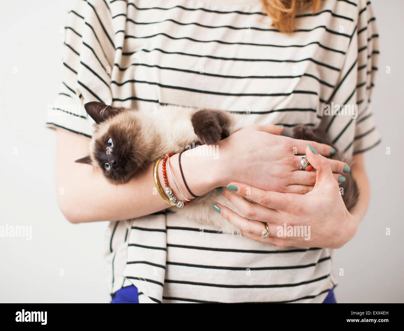 Woman with her cat hi-res stock photography and images - Alamy