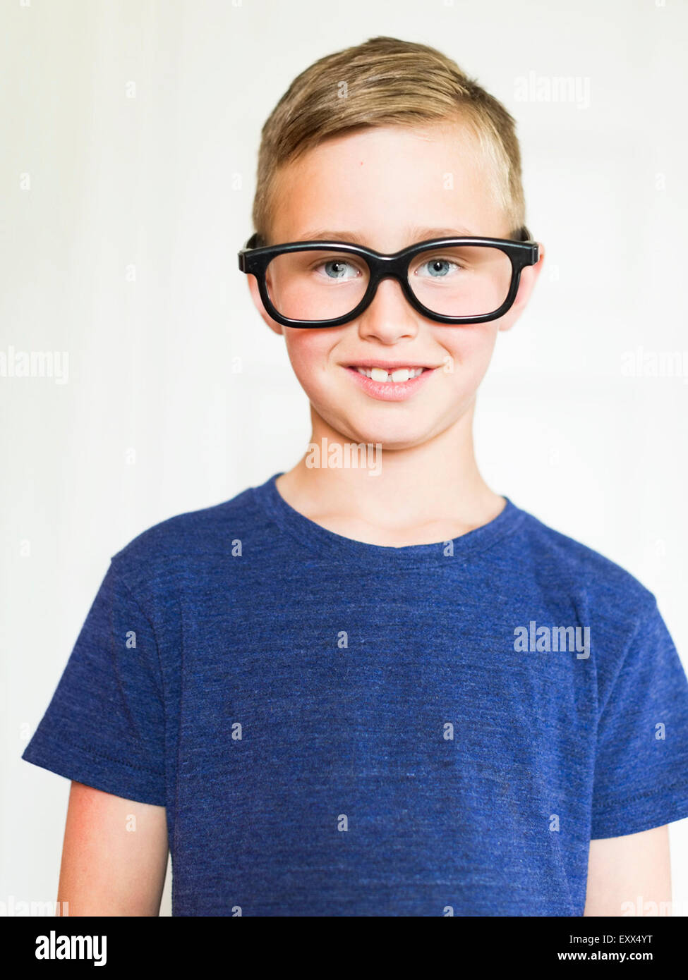 Portrait of boy (6-7) wearing eyeglasses Stock Photo - Alamy