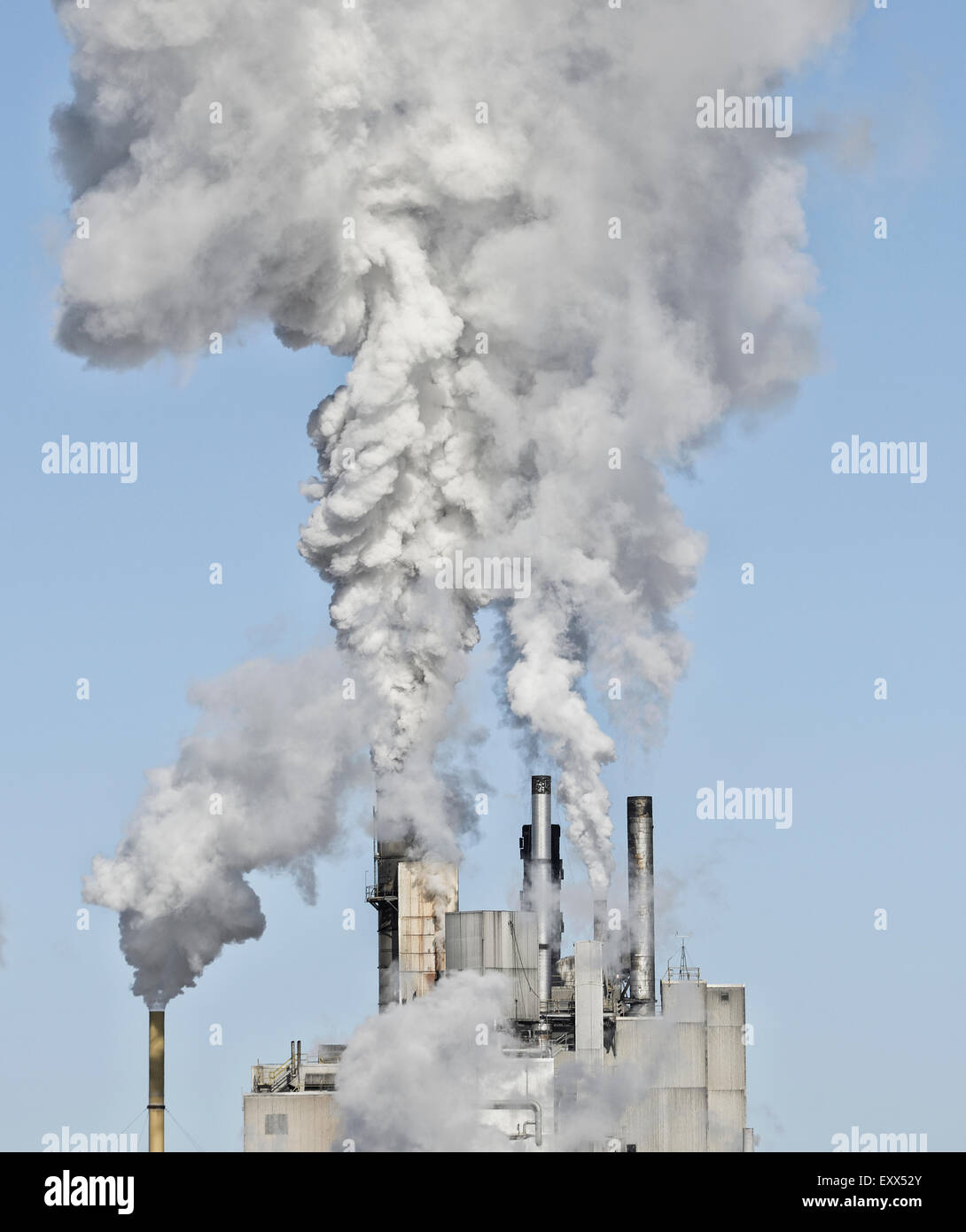 Smoke stacks emitting smoke Stock Photo - Alamy