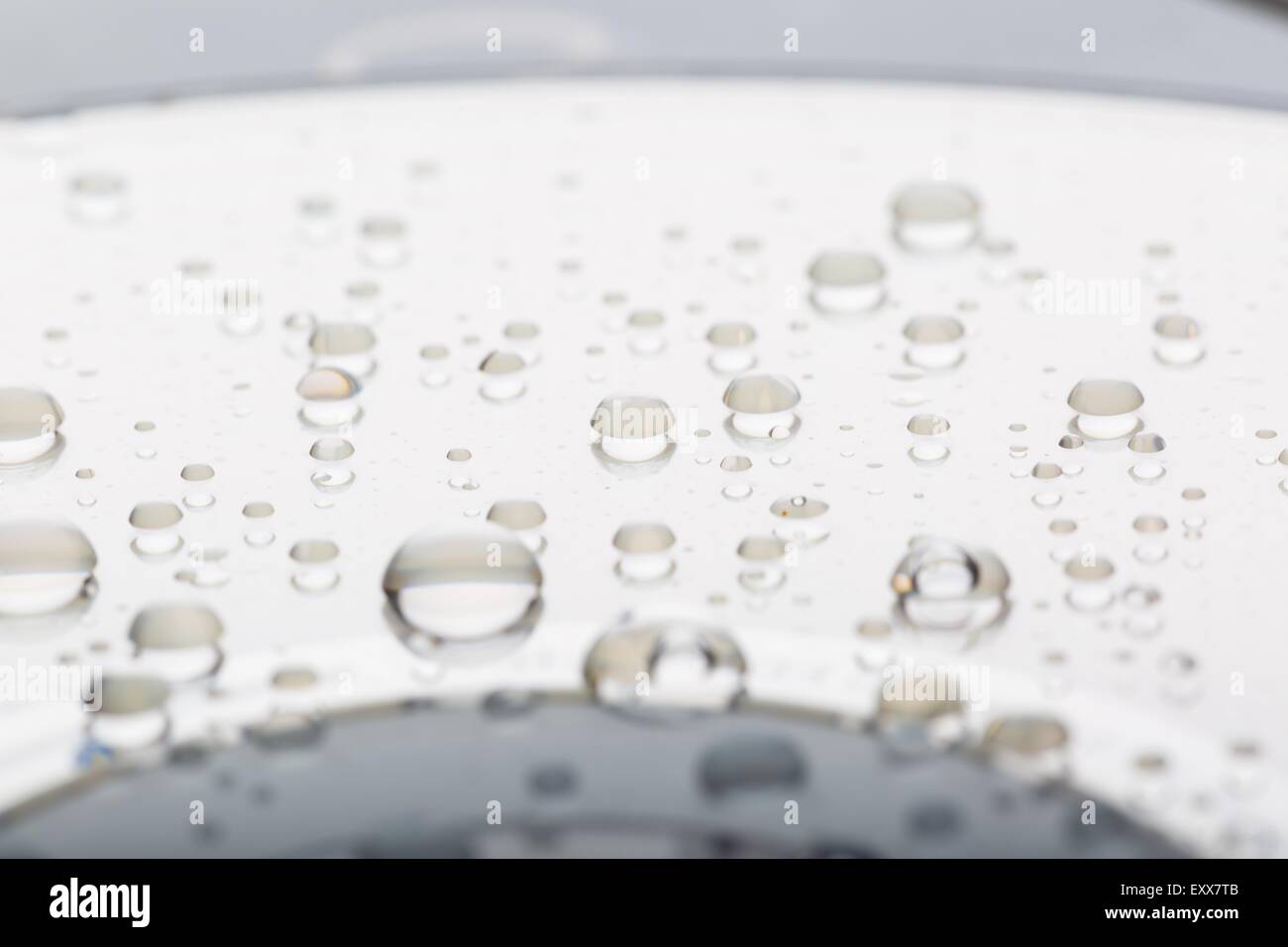 Water droplets on CD, abstraction. Water on compact disc surface Stock ...