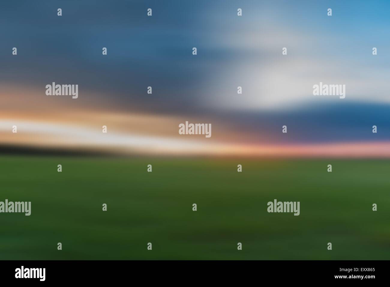 Blurry, defocused field landscape useful as background. Out of focus ...