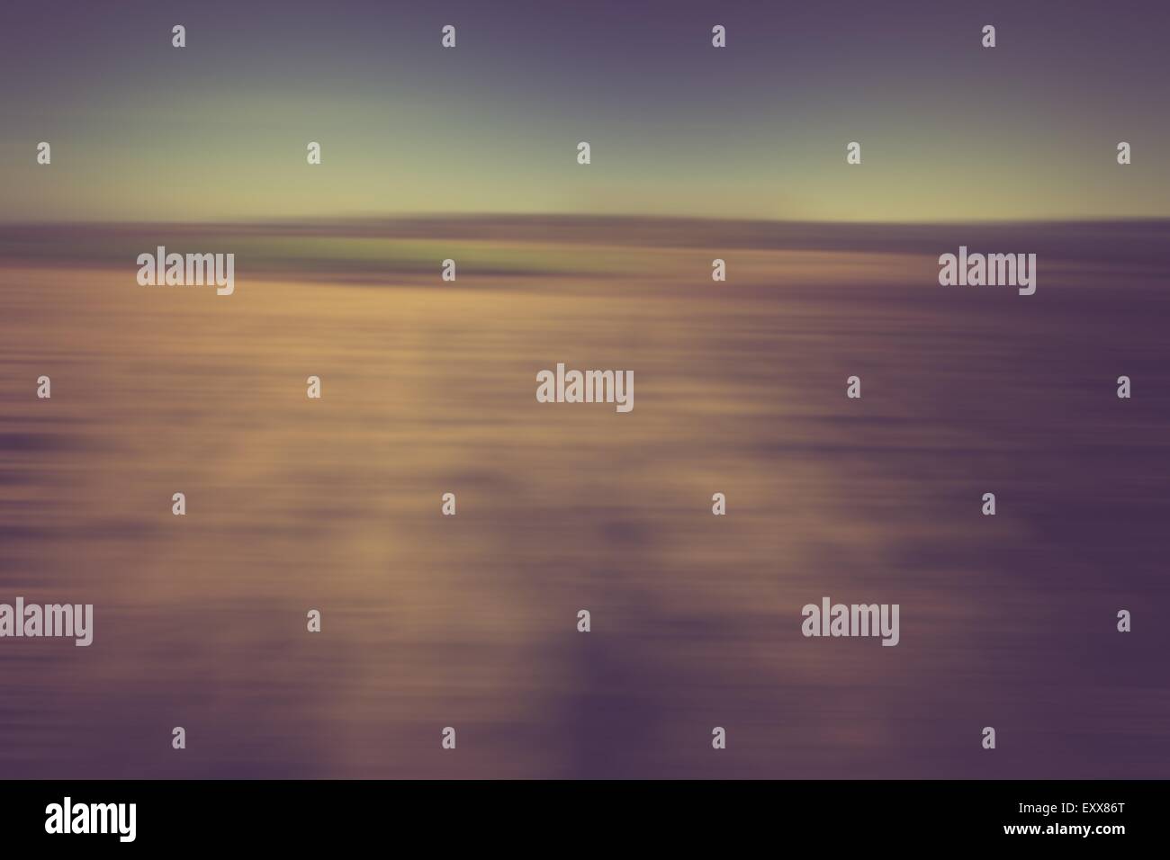 Blurry, defocused field landscape useful as background. Out of focus ...