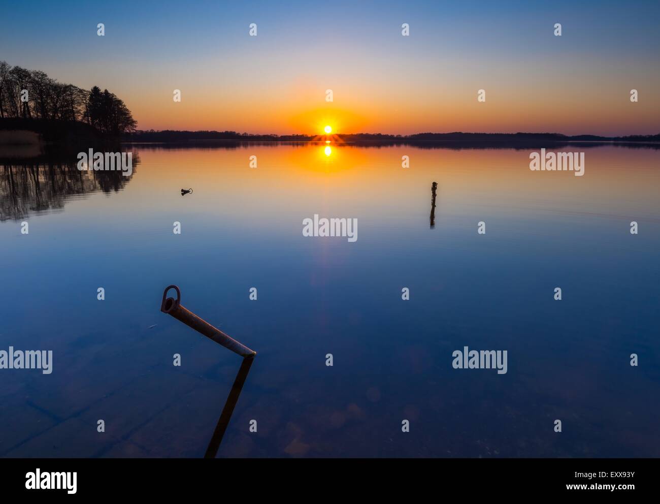 Beautiful lake at sunset. Boats mooring place.Tranquil scene ...