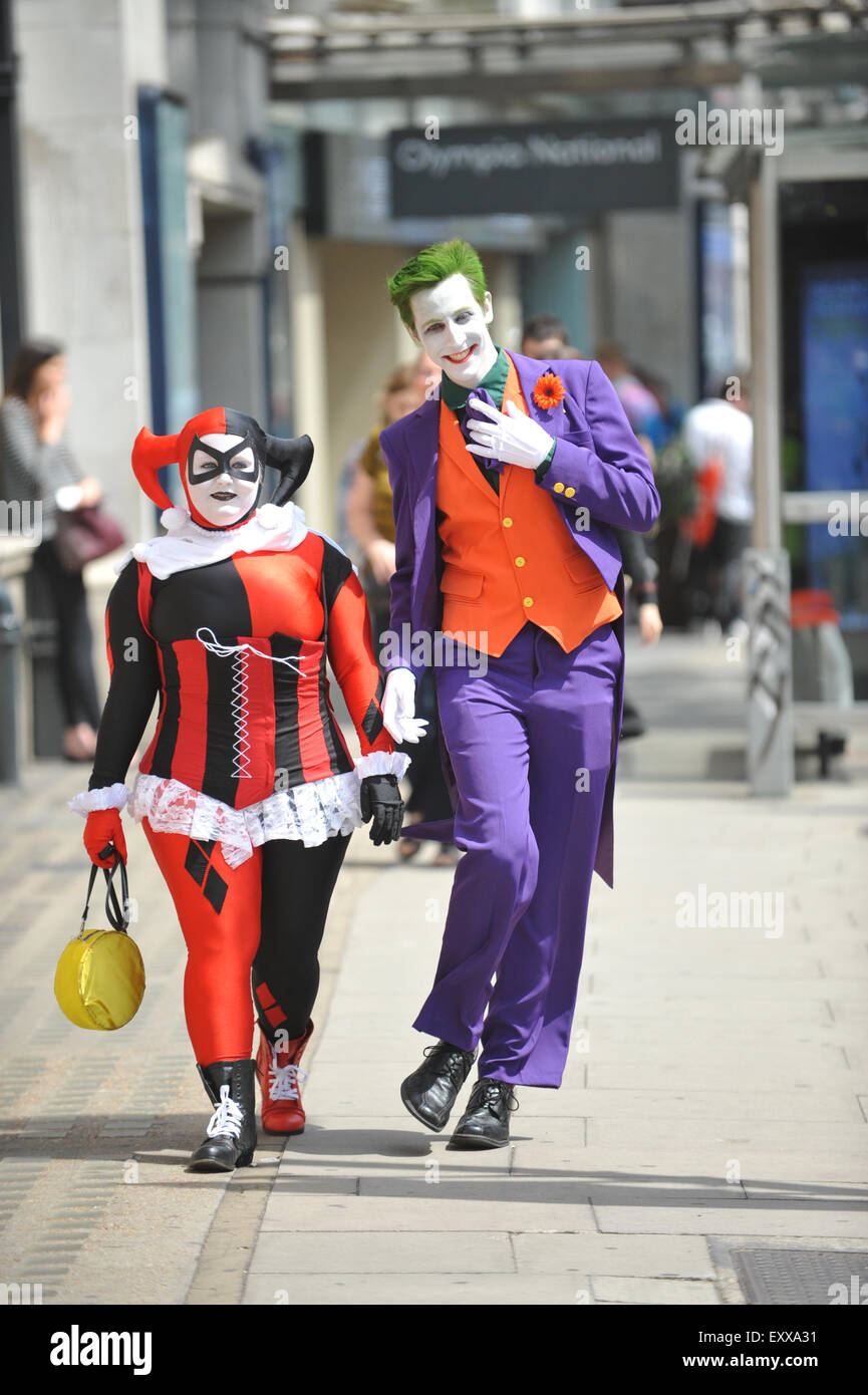 People queue for the London Film & Comic Con at London Olympia 2015 ...