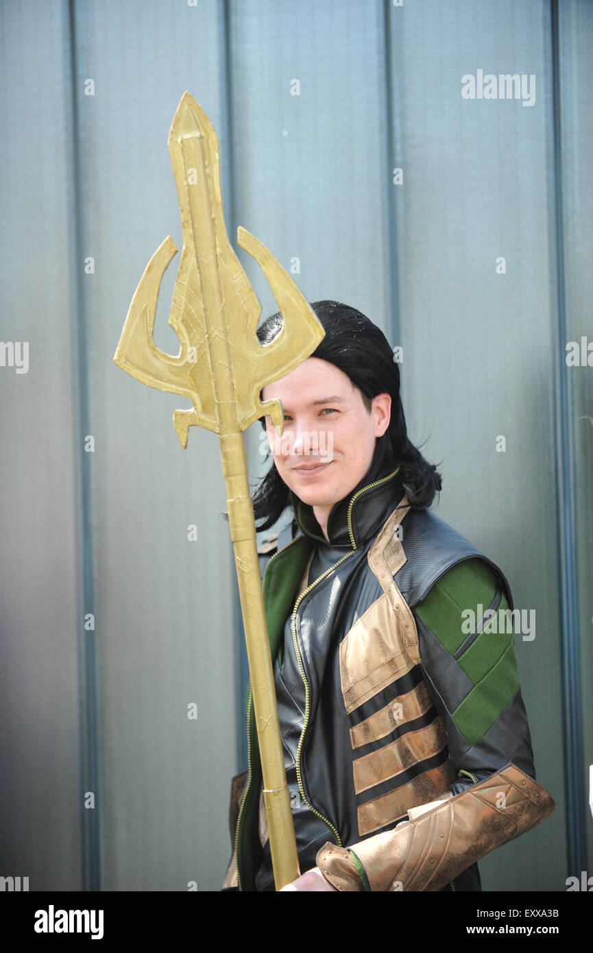 People queue for the London Film & Comic Con at London Olympia 2015 ...