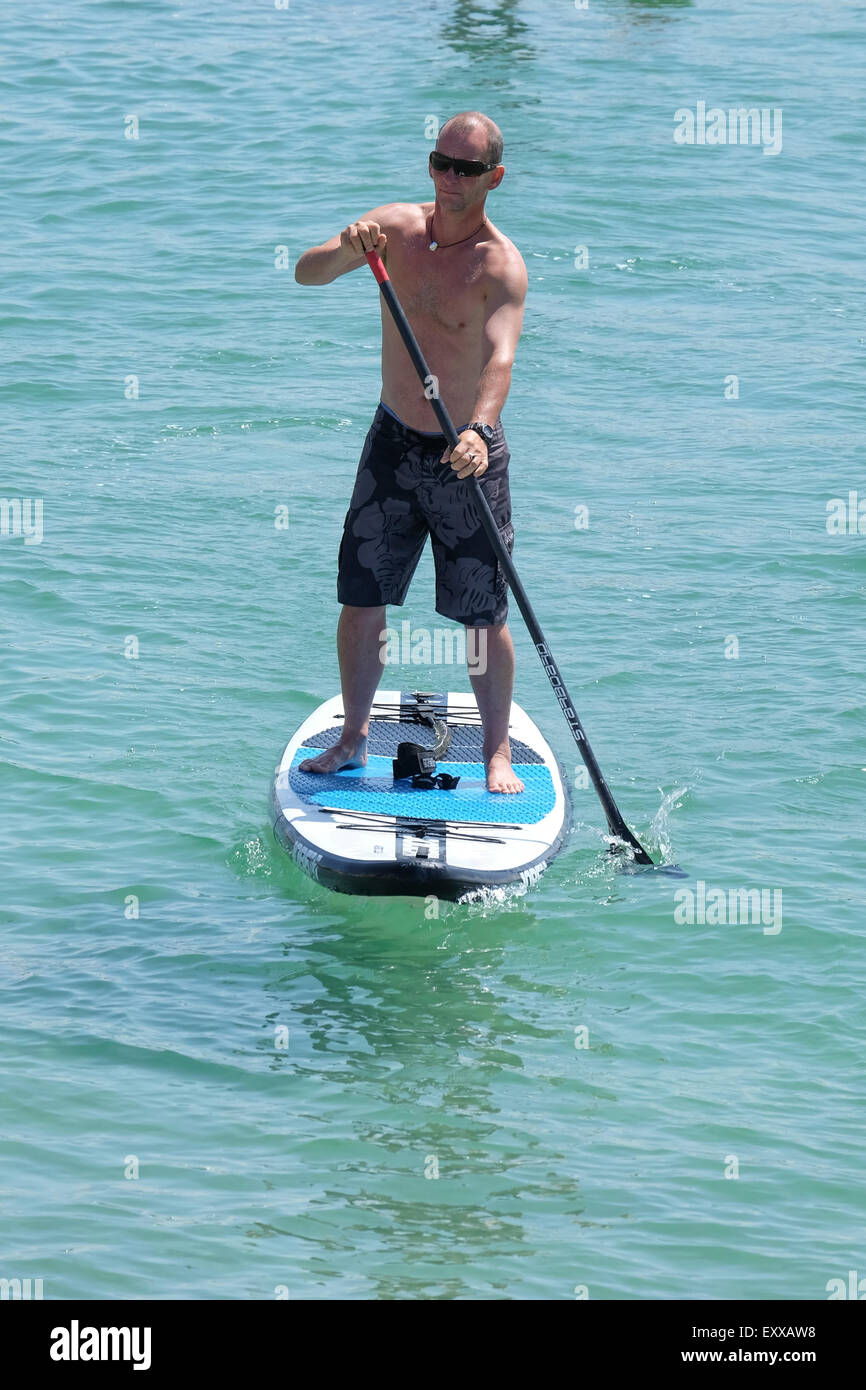 Paddleboard fishing hi-res stock photography and images - Alamy