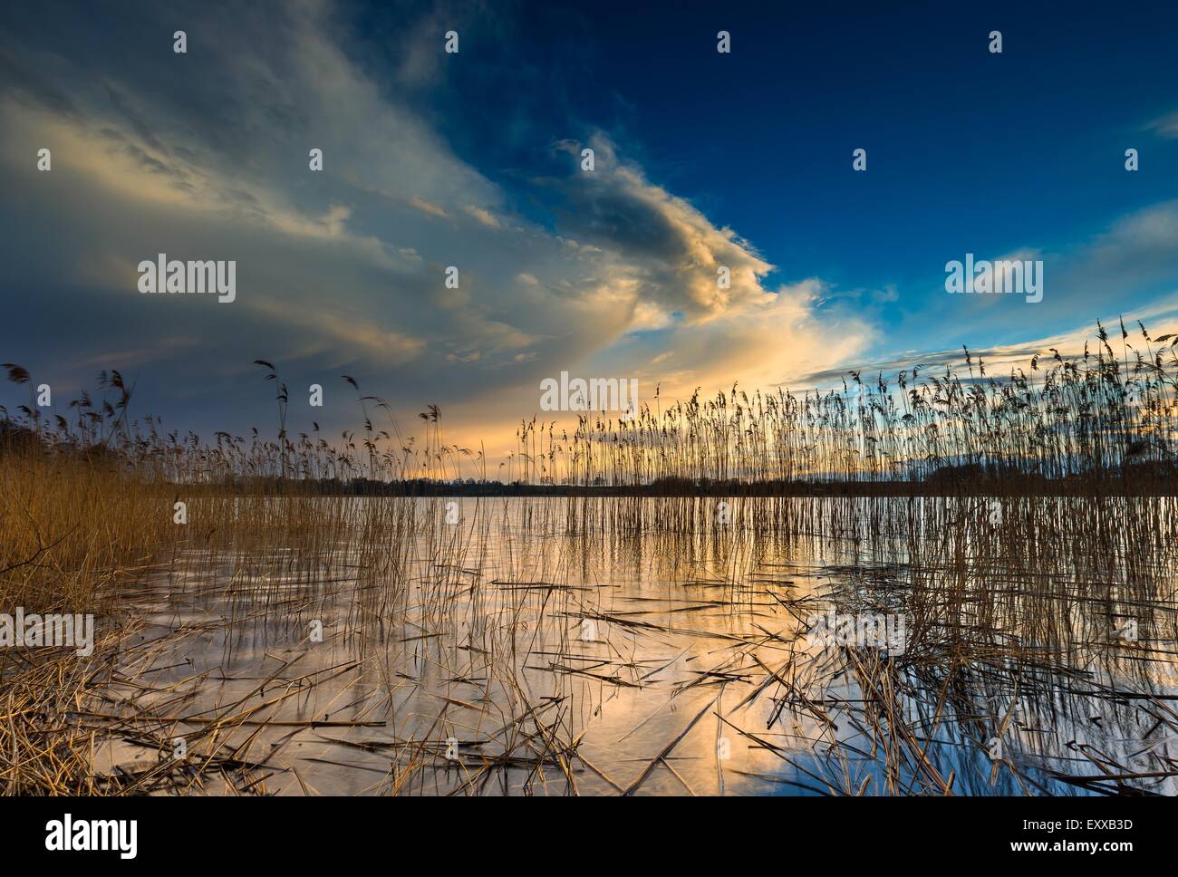 Scenic sunset over lake colorful hi-res stock photography and images ...