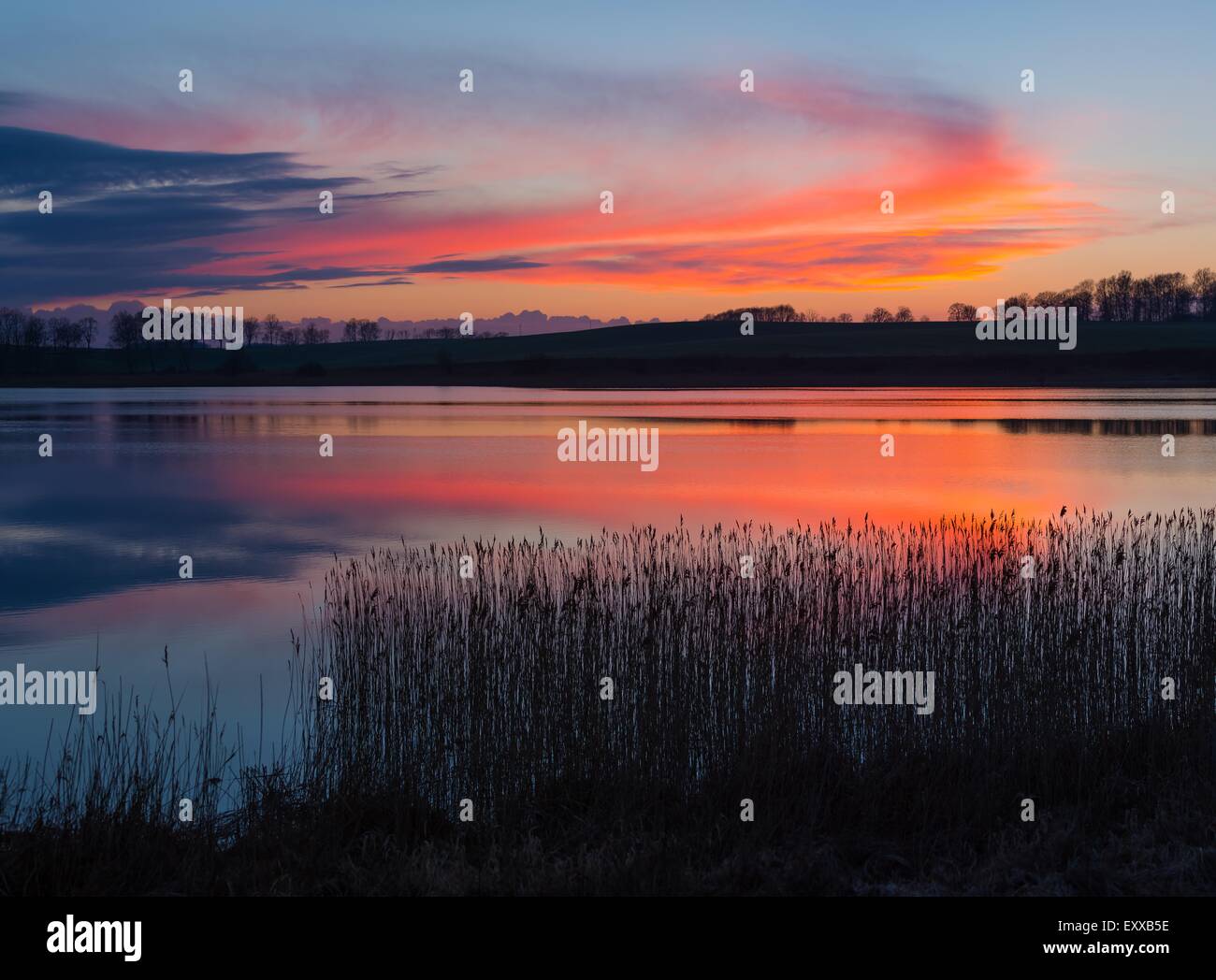 Scenic sunset over lake colorful hi-res stock photography and images ...