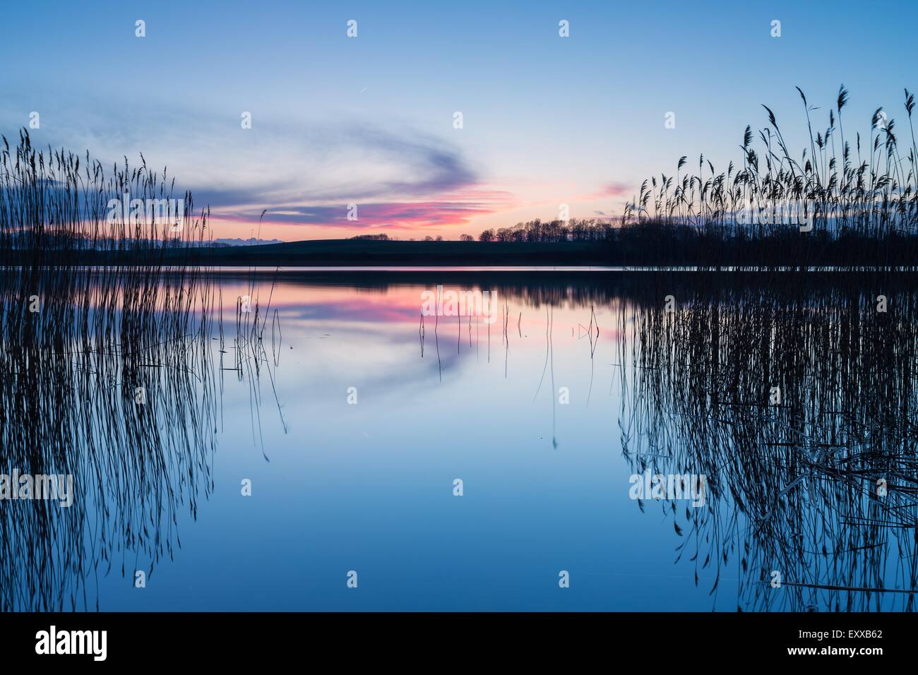 Scenic sunset over lake colorful hi-res stock photography and images ...
