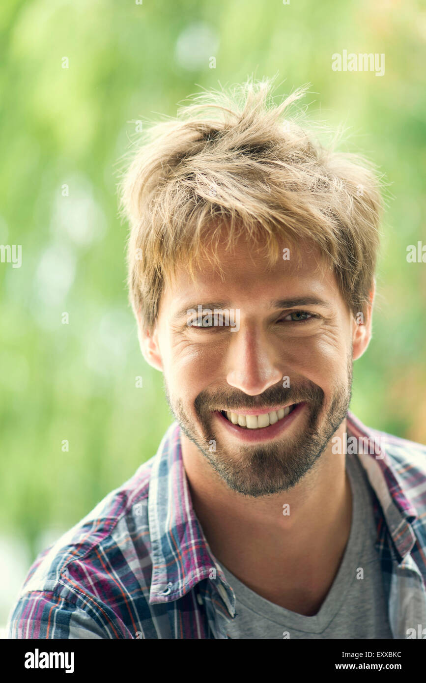 Man smiling outdoors, portrait Stock Photo - Alamy