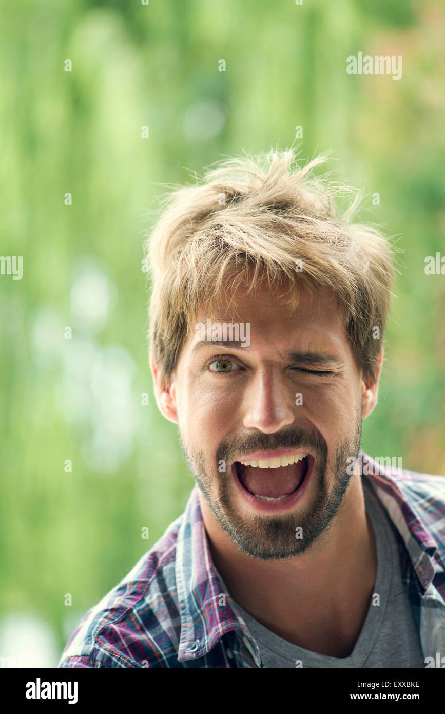 Man gestures playfully making hi-res stock photography and images - Alamy