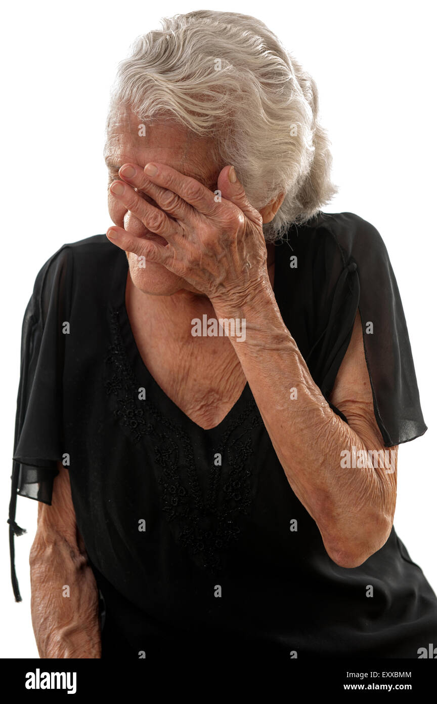 Very happy Senior smilling and covering her face Stock Photo - Alamy