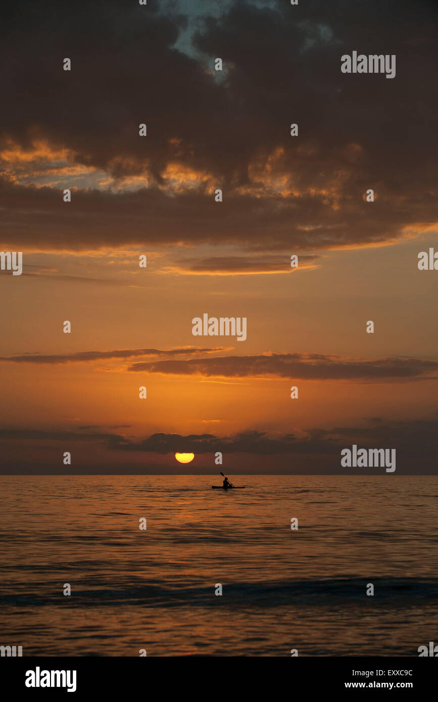 Tranquil sunset over ocean Stock Photo - Alamy