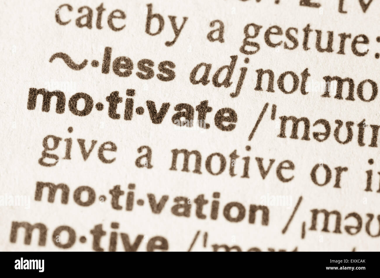 Definition of word motivate in dictionary Stock Photo - Alamy