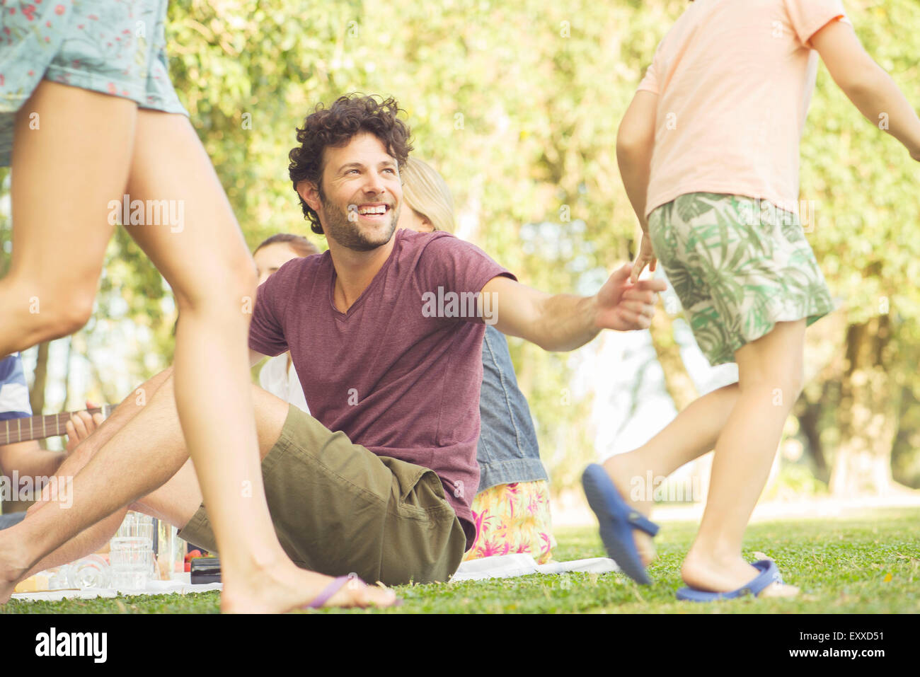 Woman watching son play park hi-res stock photography and images - Alamy