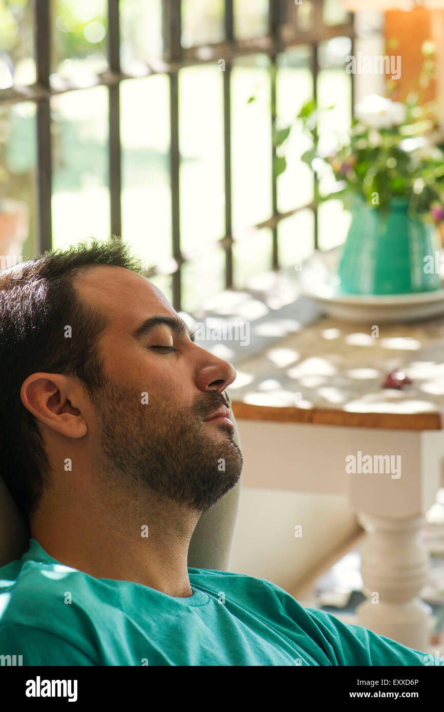 Man napping at home Stock Photo - Alamy