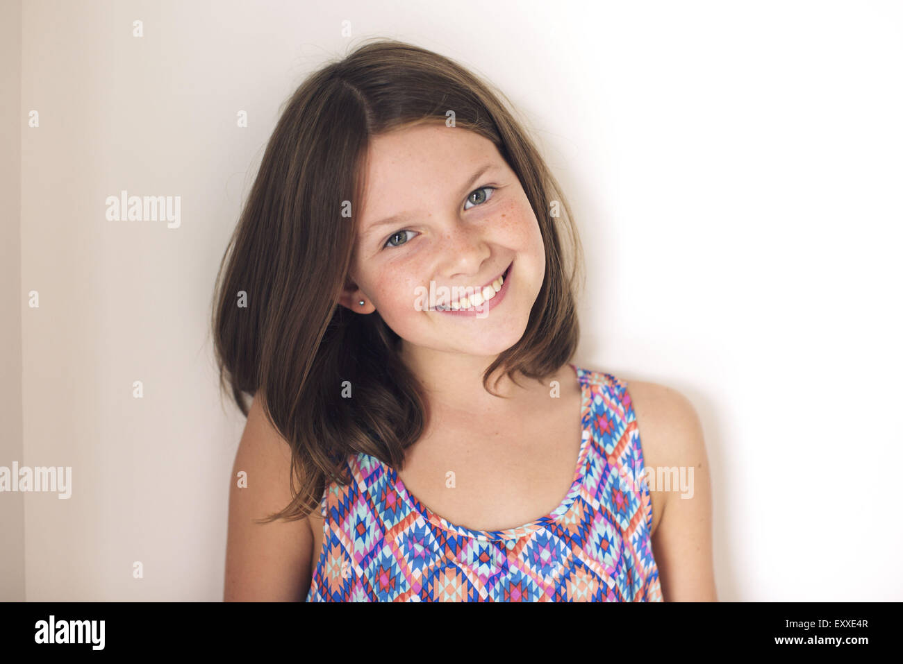 Girl smiling cheerfully, portrait Stock Photo - Alamy