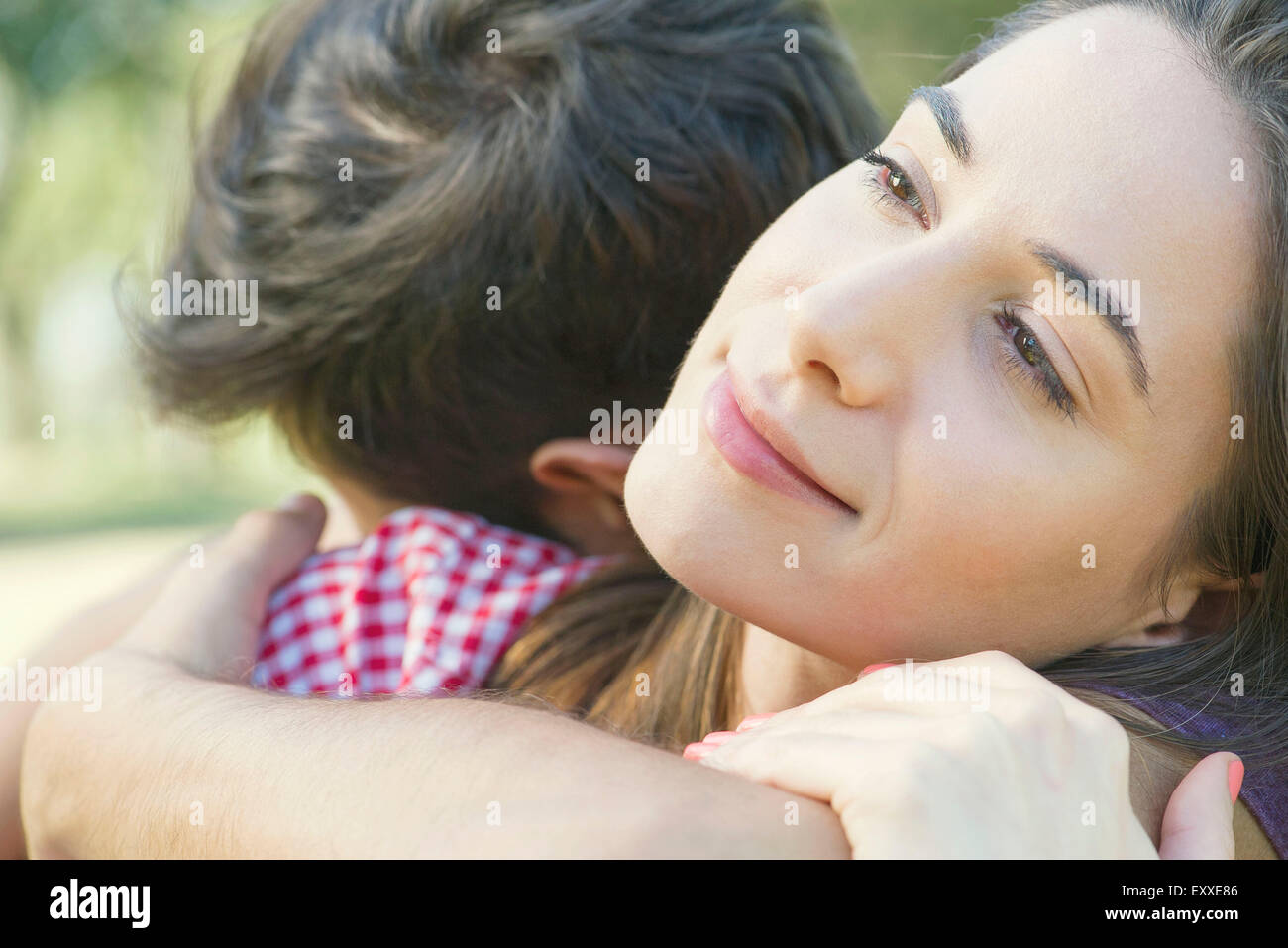 Intertwined arms hi-res stock photography and images - Alamy