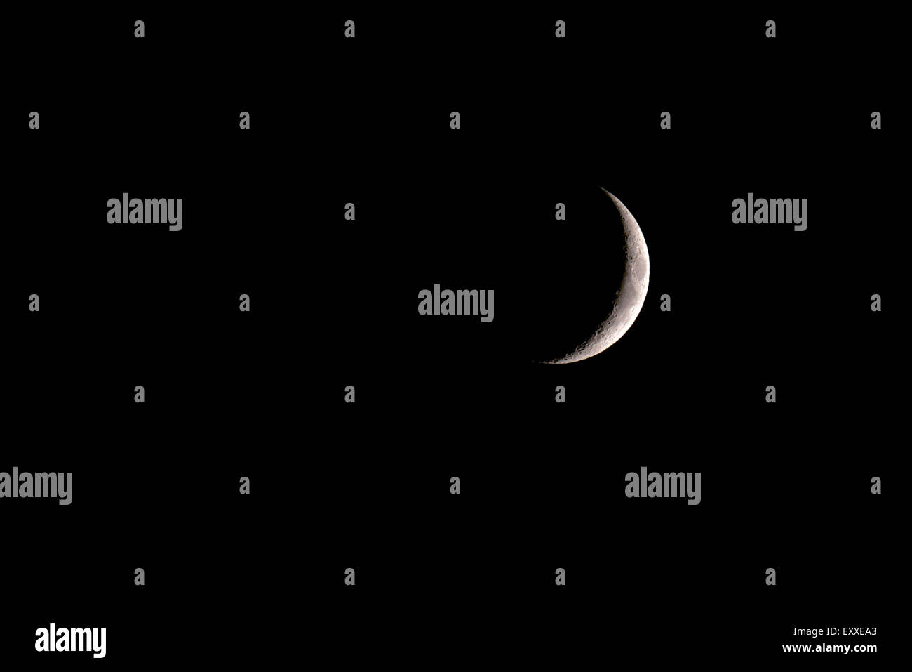 Crescent moon in night sky Stock Photo - Alamy
