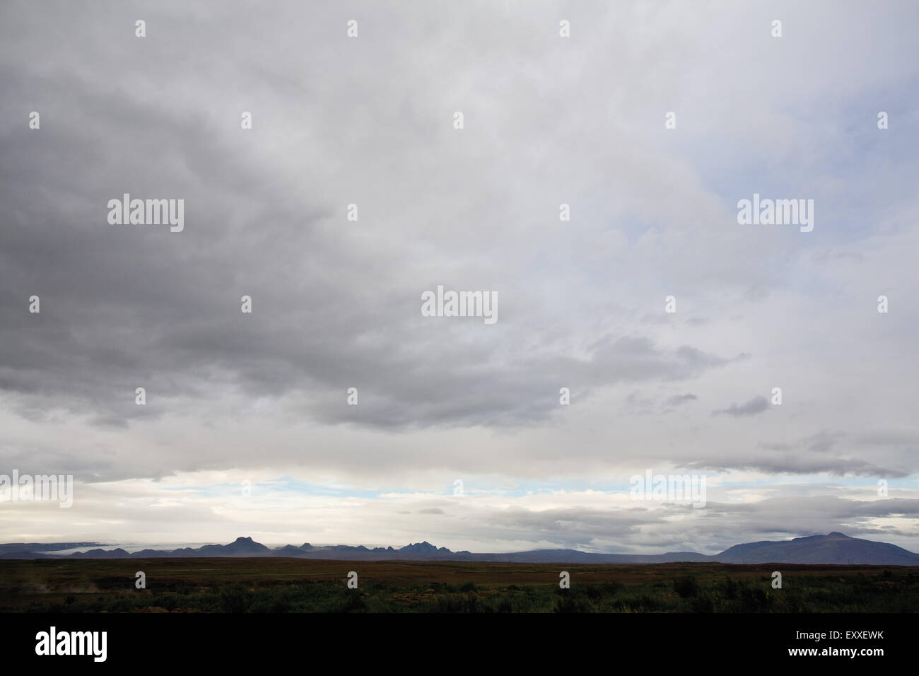 Overcast sky over flat landscape, Iceland Stock Photo - Alamy