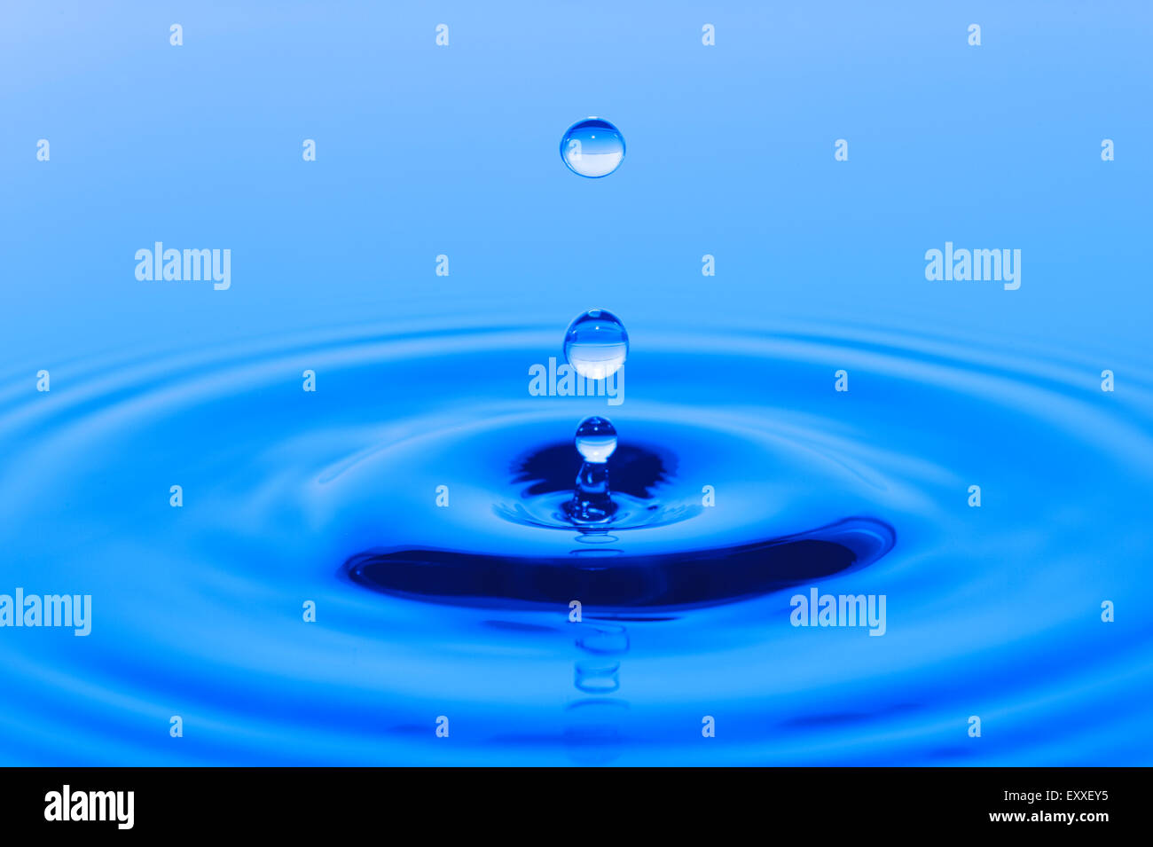 water drop is falling to surface Stock Photo - Alamy