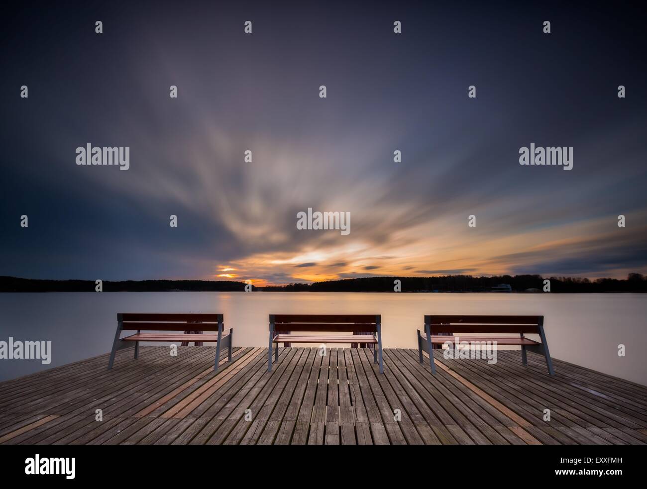 Beautiful lake landscape with vibrant sunset. Long exposure landscape ...